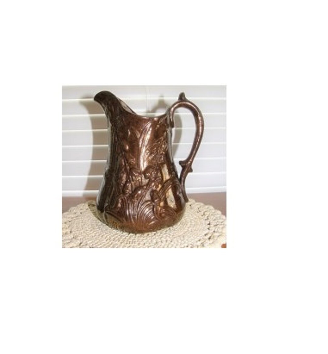 Pitcher Antique Milk Jug Rockingham Glaze Iced Copper Embossed Flowers ...