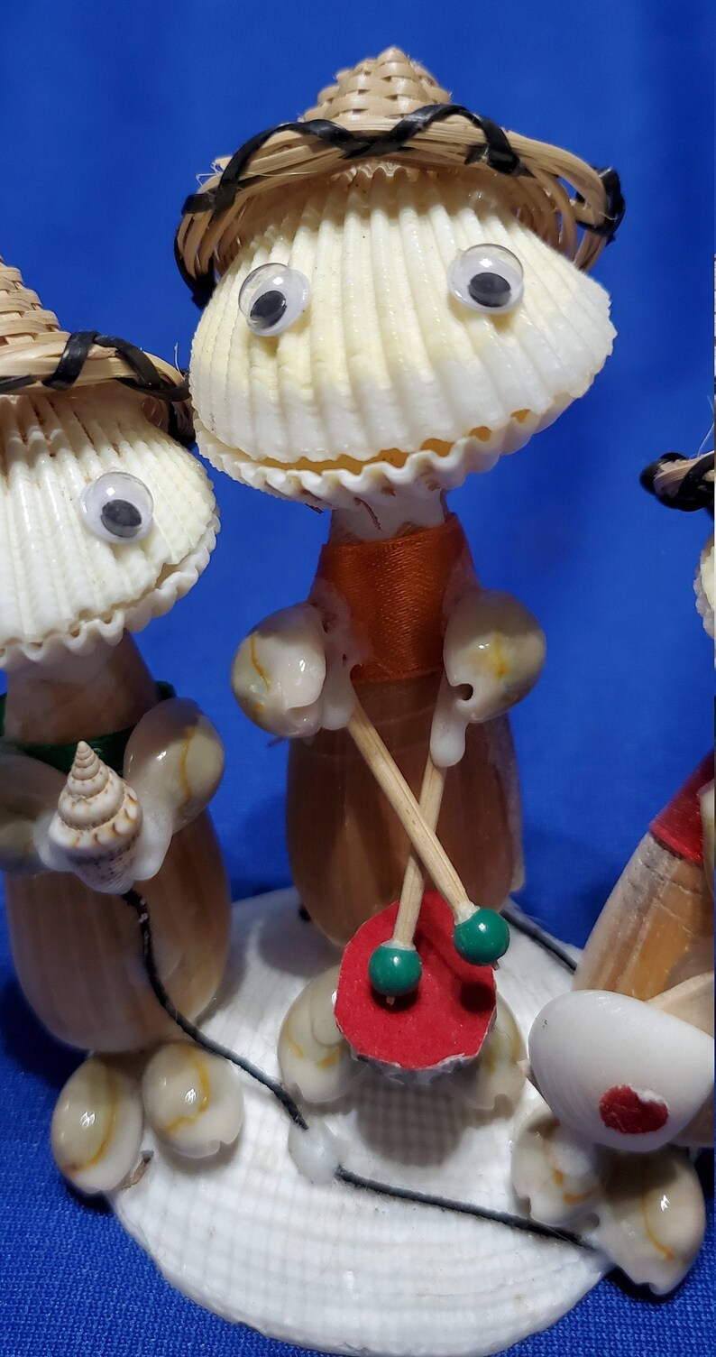 3 Man Seashell Band | Etsy