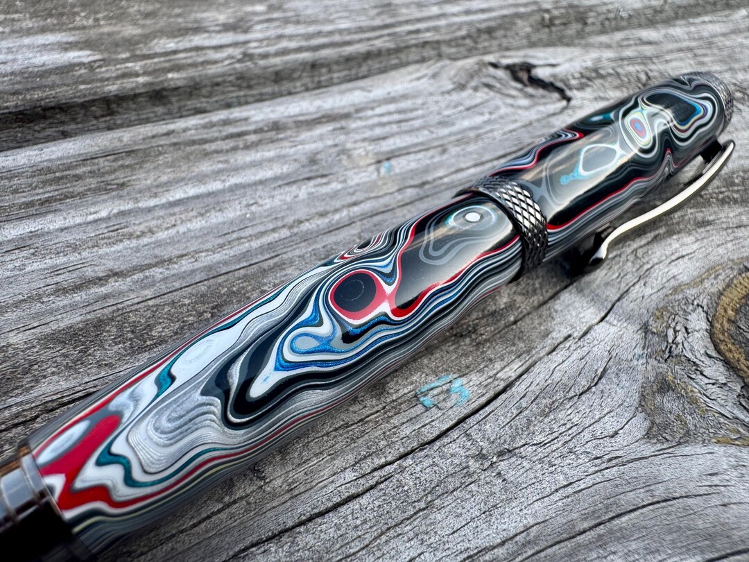 High-figured Fordite and Black Shimmer Resin Rollerball Pen | Gunmetal ...