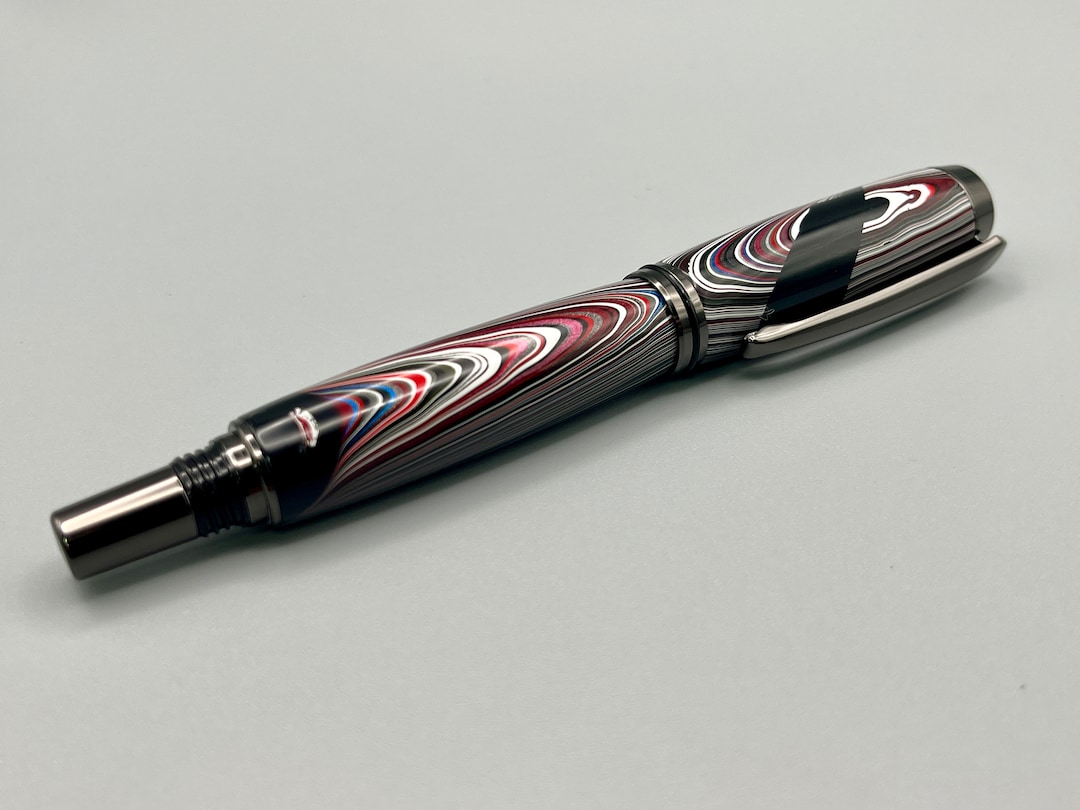 Elegantly Crafted Fordite Rollerball Pen Featuring Sleek Gunmetal ...