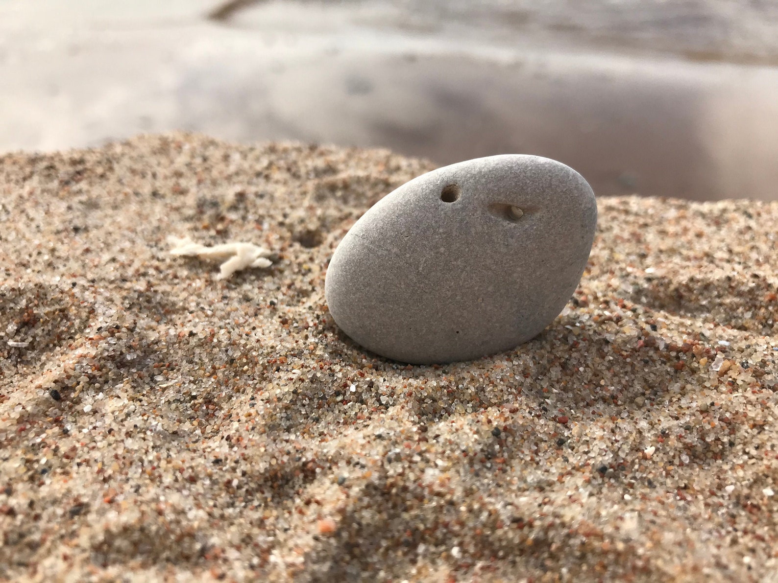 Naturally holed beach stone Sea stone with hole Holey stone | Etsy