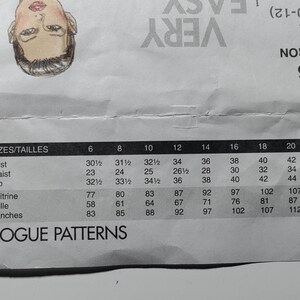 Vogue V8646 Close Fitting, Mid Knee, Wrap Dress With or Without Sleeves ...