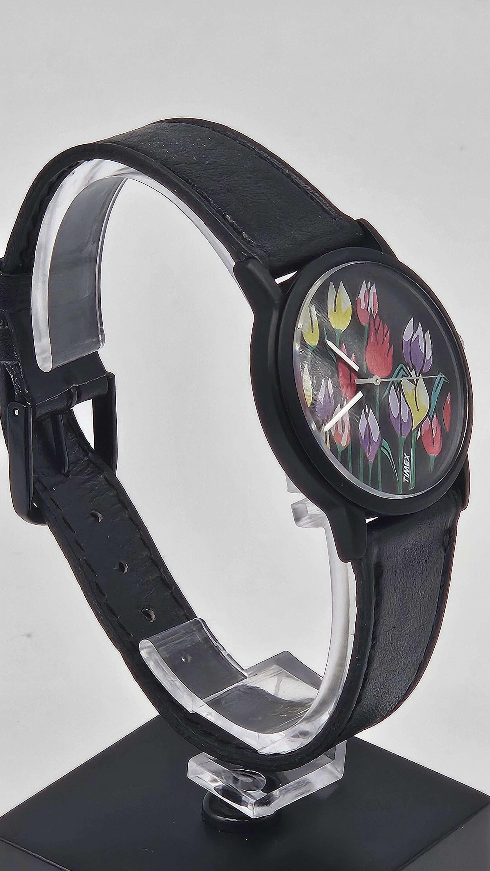 Vintage Unique Timex Watch Features a Black Face Decorated With Multi ...
