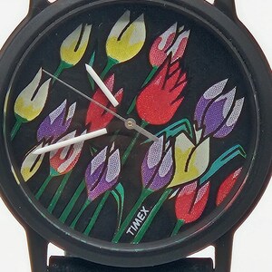Vintage Unique Timex Watch Features a Black Face Decorated With Multi ...