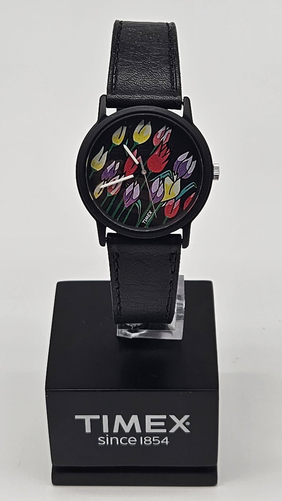 Vintage Unique Timex Watch Features a Black Face Decorated With Multi ...