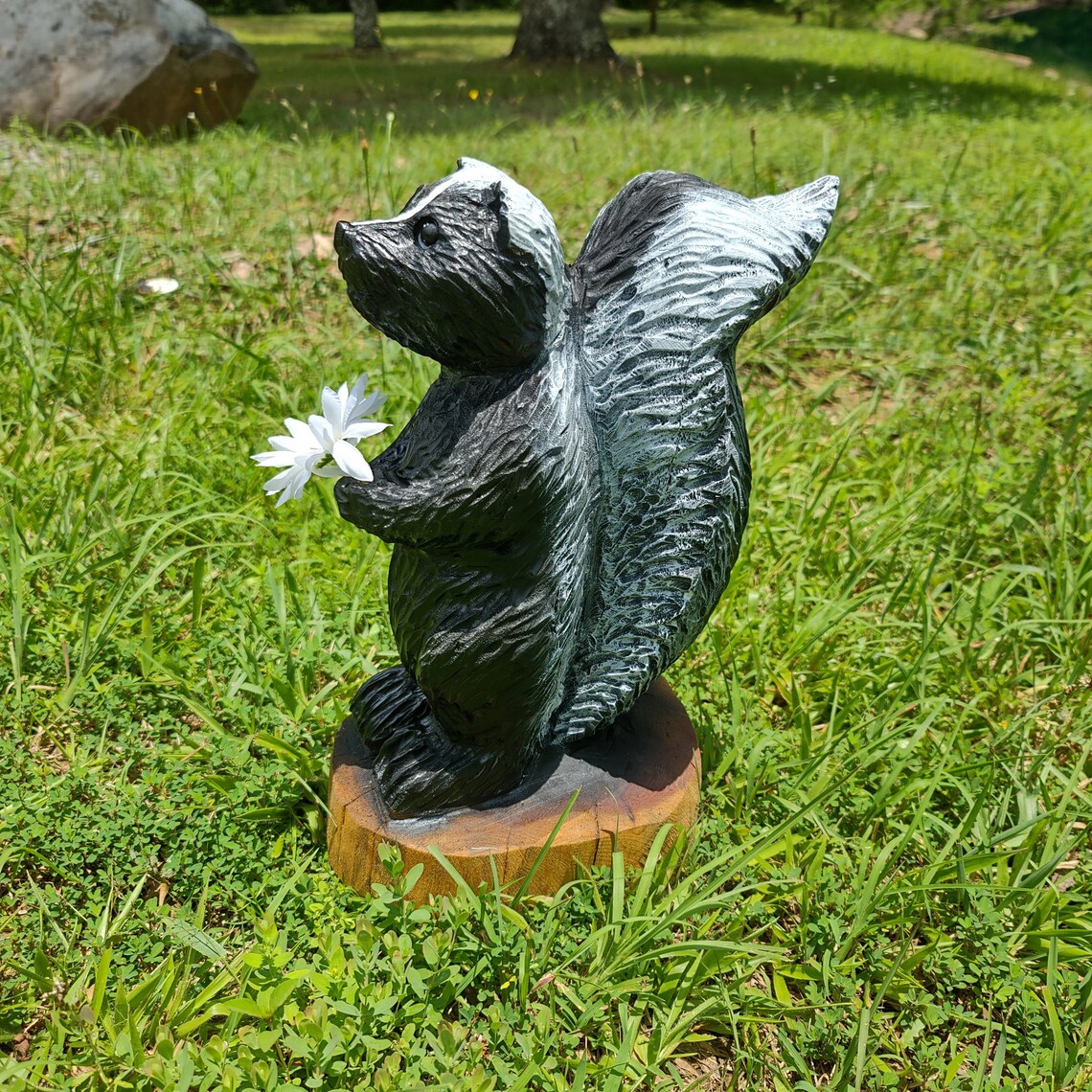Daisy-chainsaw Carved Skunk - Etsy