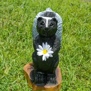 Daisy-chainsaw Carved Skunk - Etsy