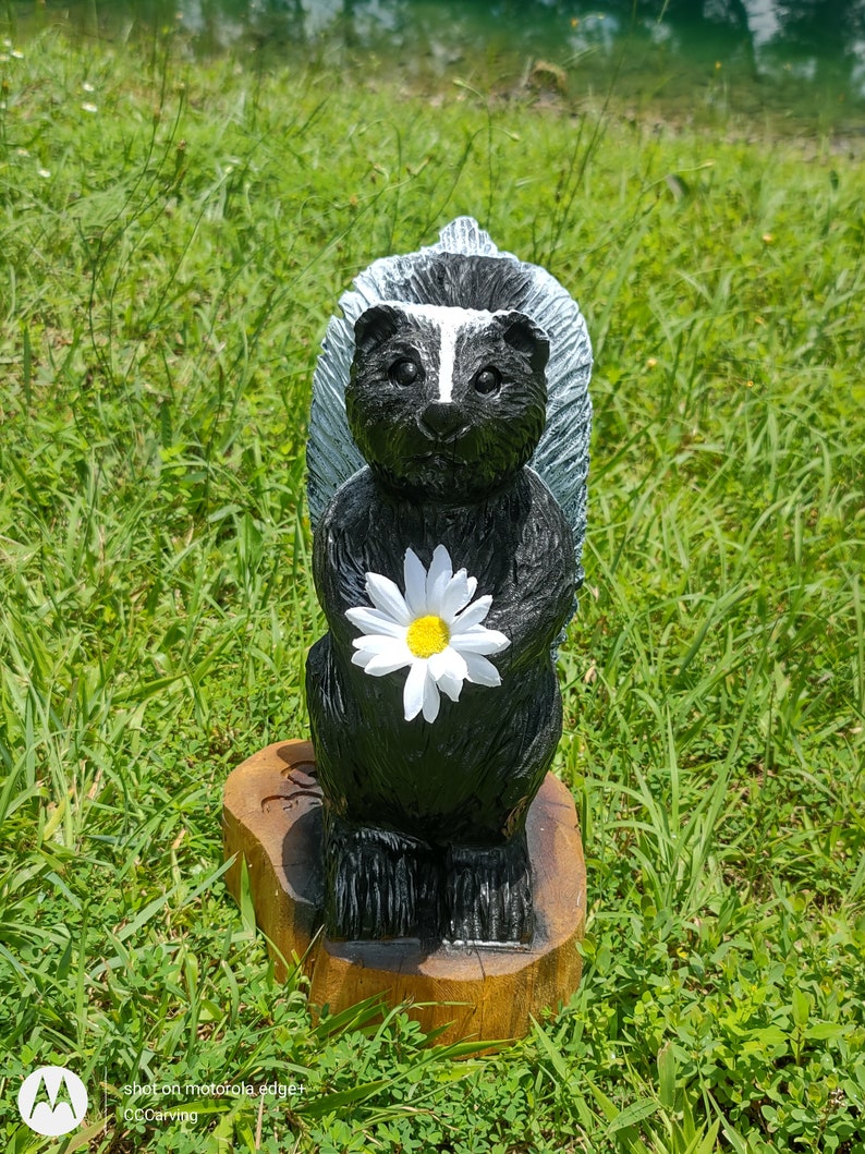 Daisy-chainsaw Carved Skunk - Etsy