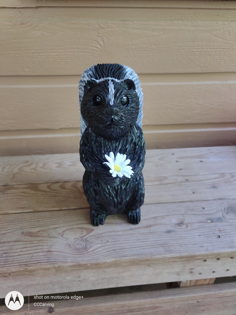 Daisy-chainsaw Carved Skunk - Etsy