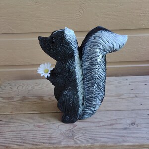 Daisy-chainsaw Carved Skunk - Etsy