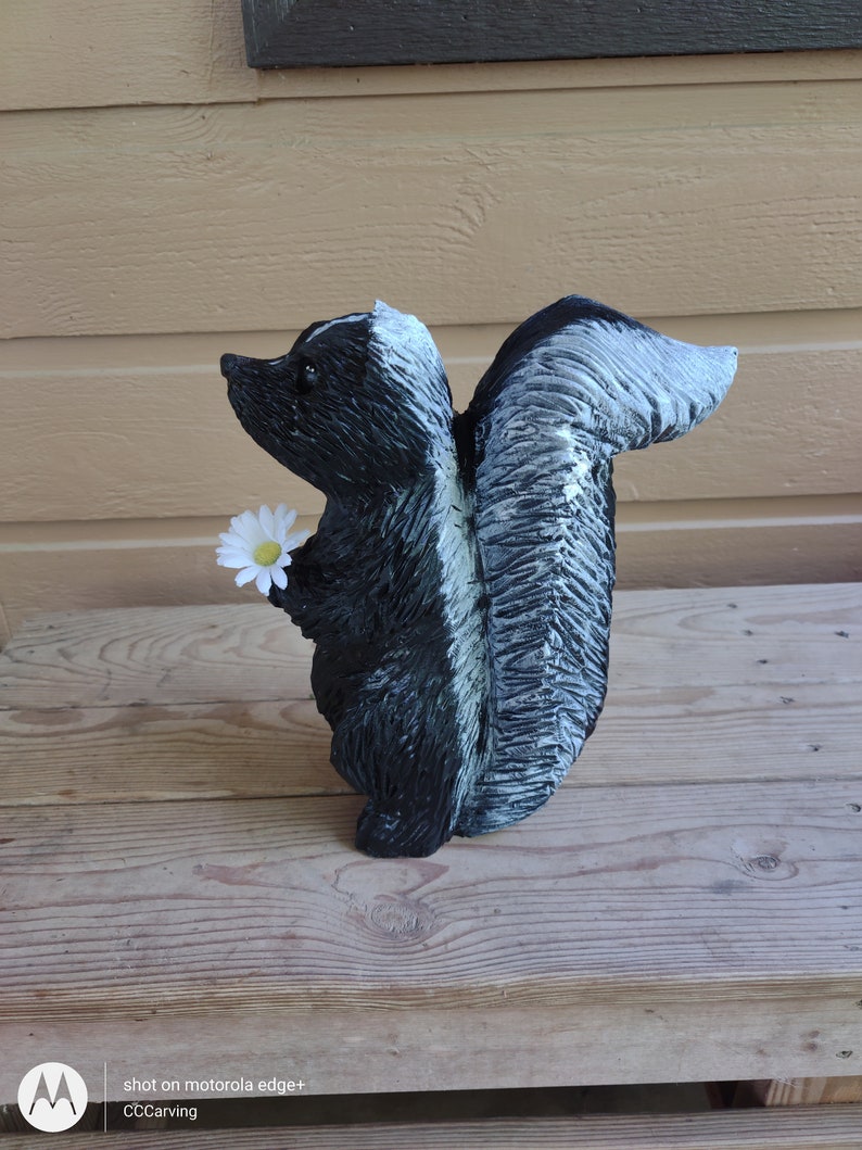 Daisy-chainsaw Carved Skunk - Etsy