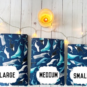 Whales Galore in Dark Blue Padded Book Sleeve | Book Protector | Book ...