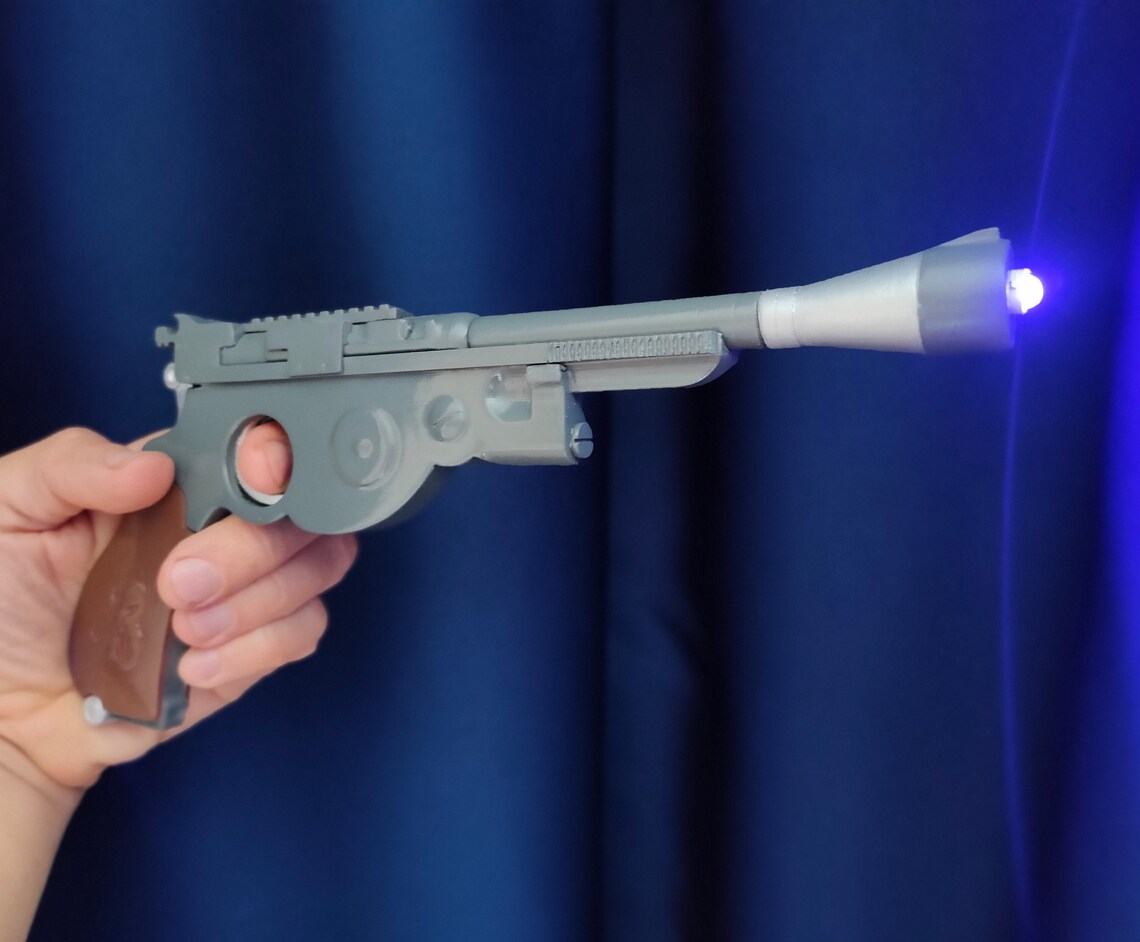 Mandalorian blaster for children with light | Etsy