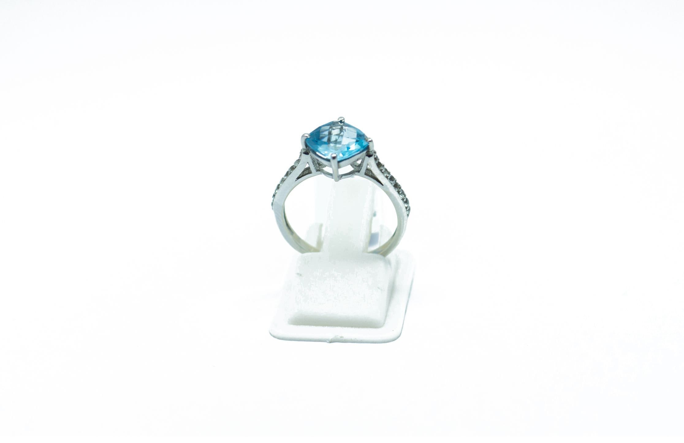 Delicate sky blue topaz birthstone ring/silver | Etsy