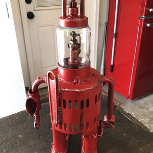 Scrap Metal Robot 148, A Red Robot With a Jar Head and Available for ...