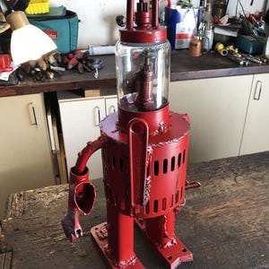 Scrap Metal Robot 148, A Red Robot With a Jar Head and Available for ...
