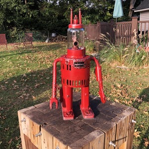 Scrap Metal Robot 148, A Red Robot With a Jar Head and Available for ...