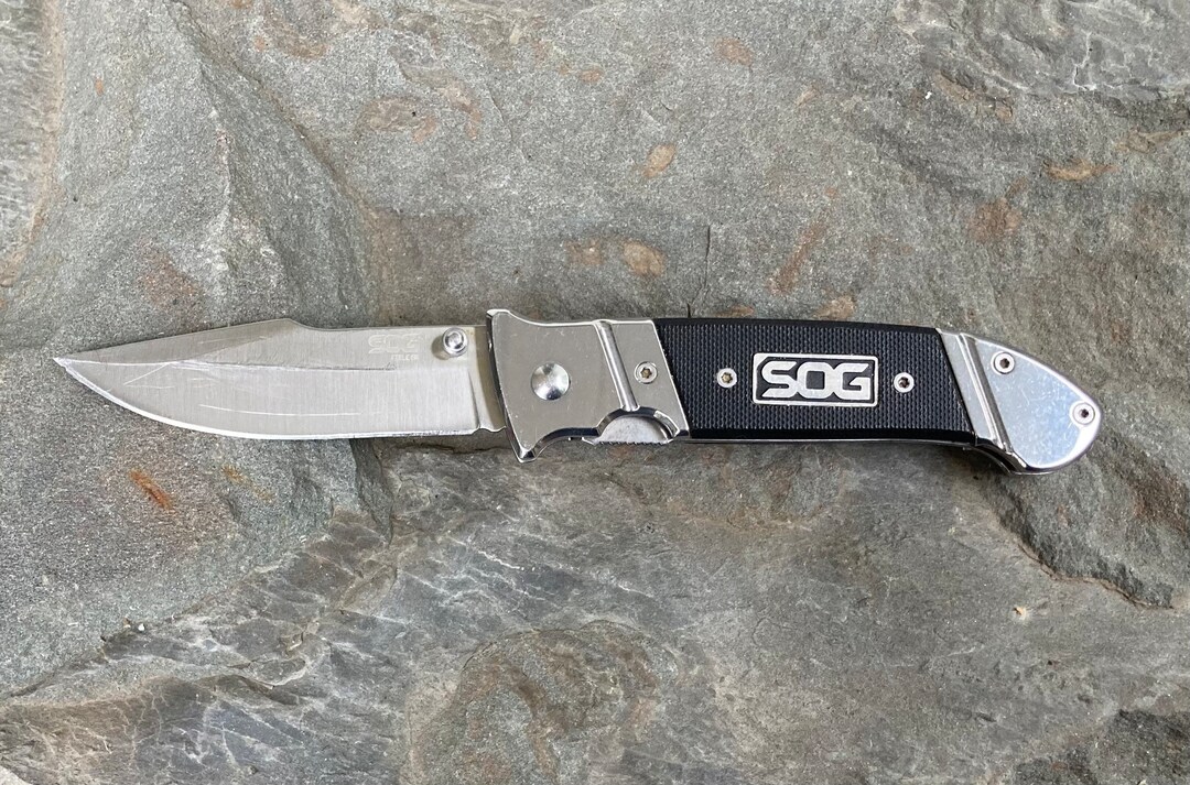 Preowned SOG Fielder Linerlock Black Handle Stainless Bolsters Folding ...