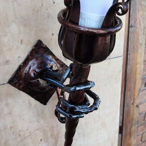 Forged Lamps & Torches Wrought Iron Skeleton Hand Torch - Medieval Wall ...