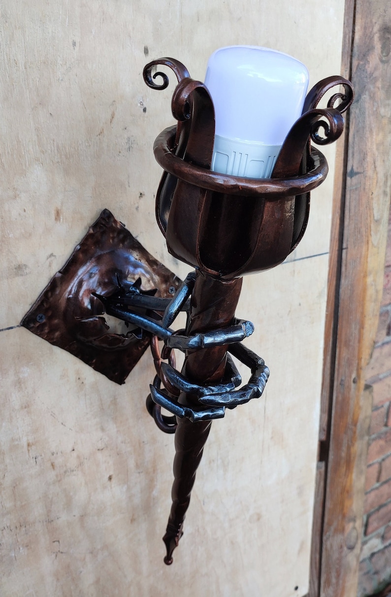 Forged Lamps & Torches Wrought Iron Skeleton Hand Torch - Medieval Wall ...