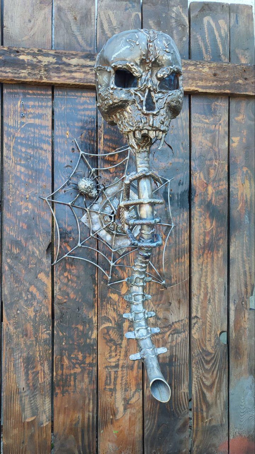 Hand Forged Gothic Wall Torch – Skeleton Hand Holding Skull and Spine ...
