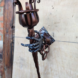 Forged Lamps & Torches Wrought Iron Skeleton Hand Torch - Medieval Wall ...