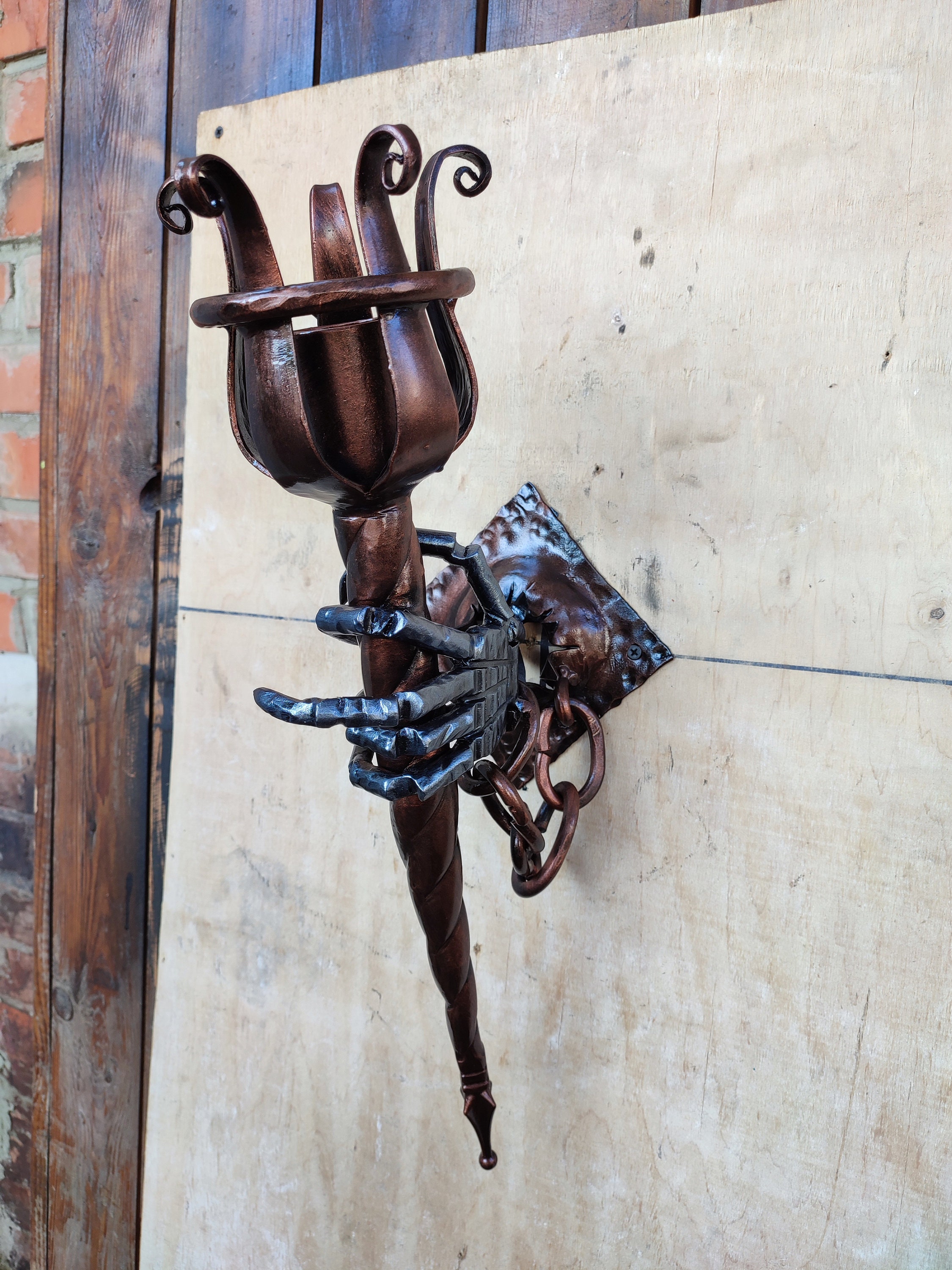 Forged Lamps & Torches Wrought Iron Skeleton Hand Torch - Medieval Wall ...