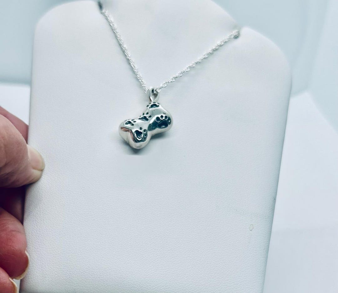 Sterling Silver Pet Cremation Bone Urn Pendant With Paw Prints - Etsy
