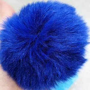 Light Blue Fluffy Faux Fur Puff Ball With Real Blue Flowers Horror ...