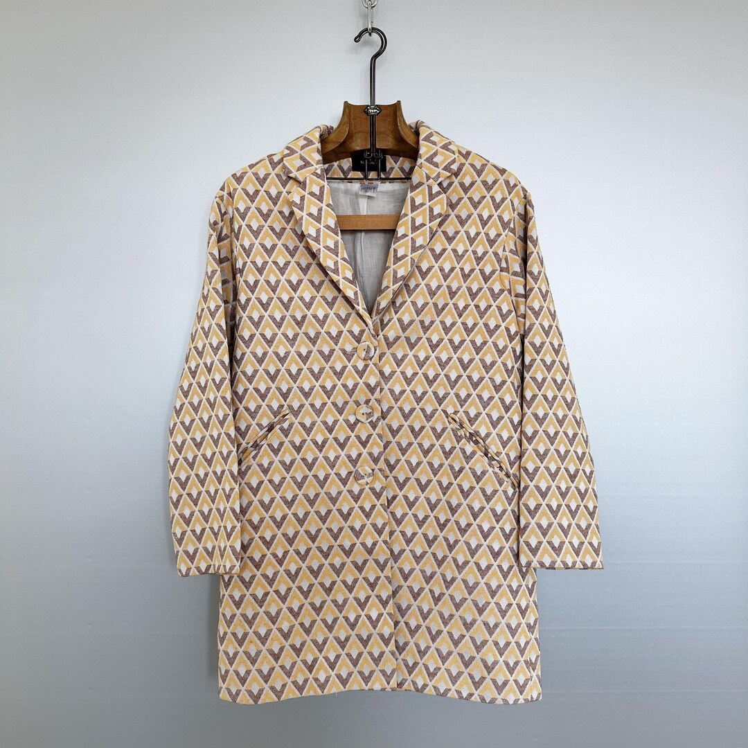 Vintage Diamond Pattern Coat | Bold Orange and Brown Geometric Design ...