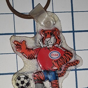 1970s ESSO Gas KEYCHAIN Put A Tiger in Your Tank - Playing Soccer ...