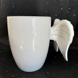 SIMBOLIKS Ceramic Mug With White Angel Wings Handle Size 8.5 Cm ...