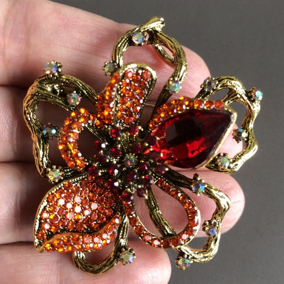 Gemstone encrusted brooch store