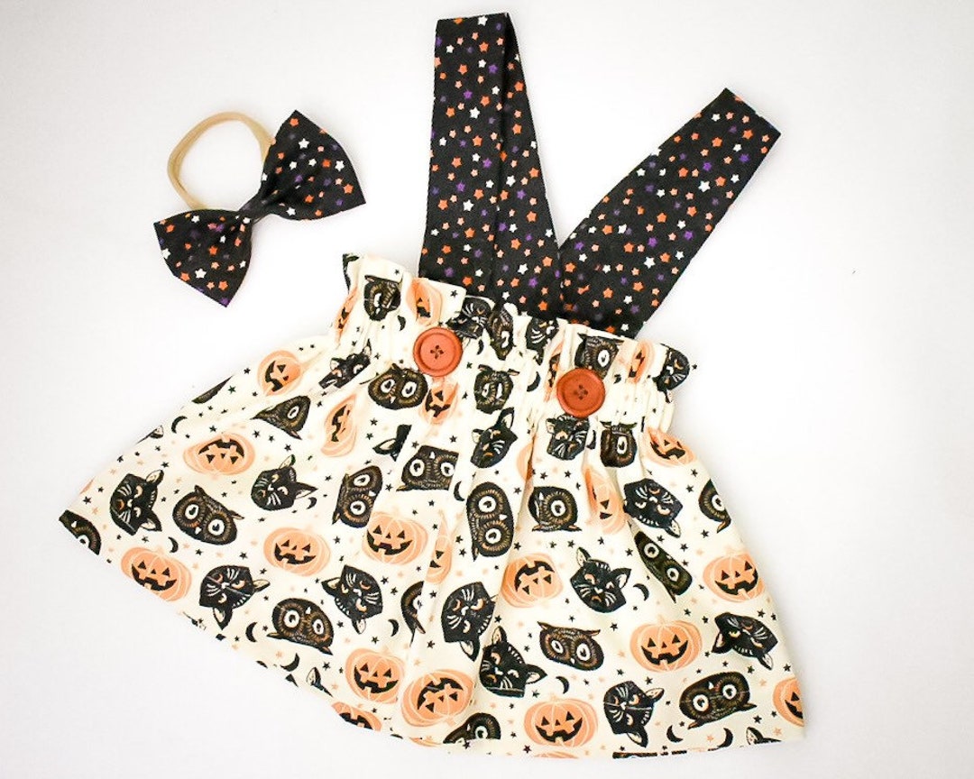 Tossed Cat Heads on Ivory With Glow in the Dark Stars Suspenders ...