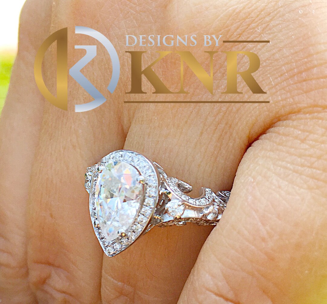 Pear Shape and Round Cut Sides Simulated Diamonds Engagement Ring Halo ...
