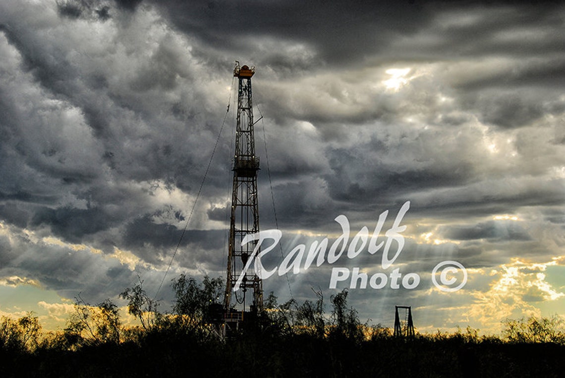 A West Texas Oil Drilling Rig in Operation as Storm Clouds Gather in ...