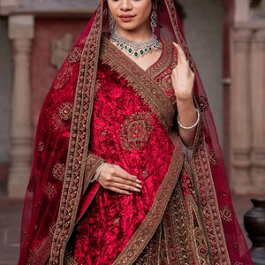 Lehenga: Exquisite Ruby Imperial Lehenga With Hand-embroidery in Velvet ...
