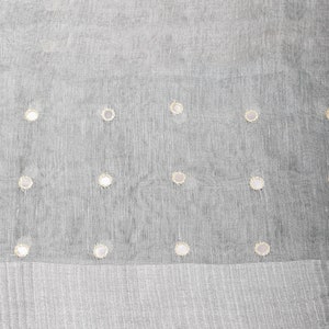 Cutwork and Mirror Work Tissue Linen Saree in White Silver With ...