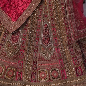 Lehenga: Exquisite Ruby Imperial Lehenga With Hand-embroidery in Velvet ...