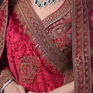 Lehenga: Exquisite Ruby Imperial Lehenga With Hand-embroidery in Velvet ...