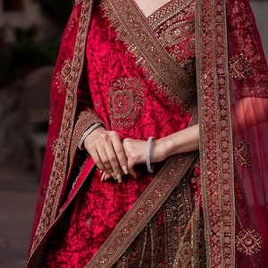 Lehenga: Exquisite Ruby Imperial Lehenga With Hand-embroidery in Velvet ...