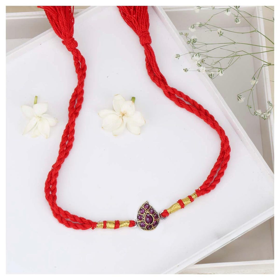 Pure 92.5 Thilagam Siloni Silver Rakhi With Tear Drop Shaped Motif ...