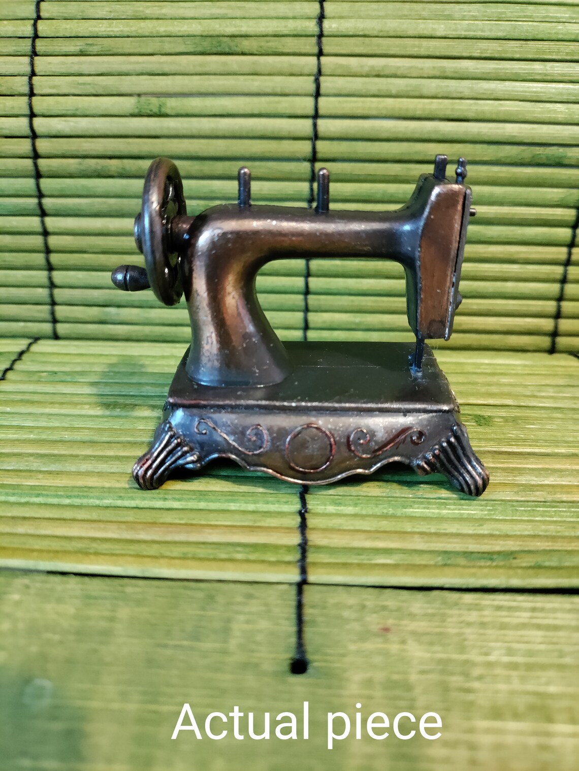 A Coppery Miniature Metal Sewing Machine Was Made in Hong Kong as an ...