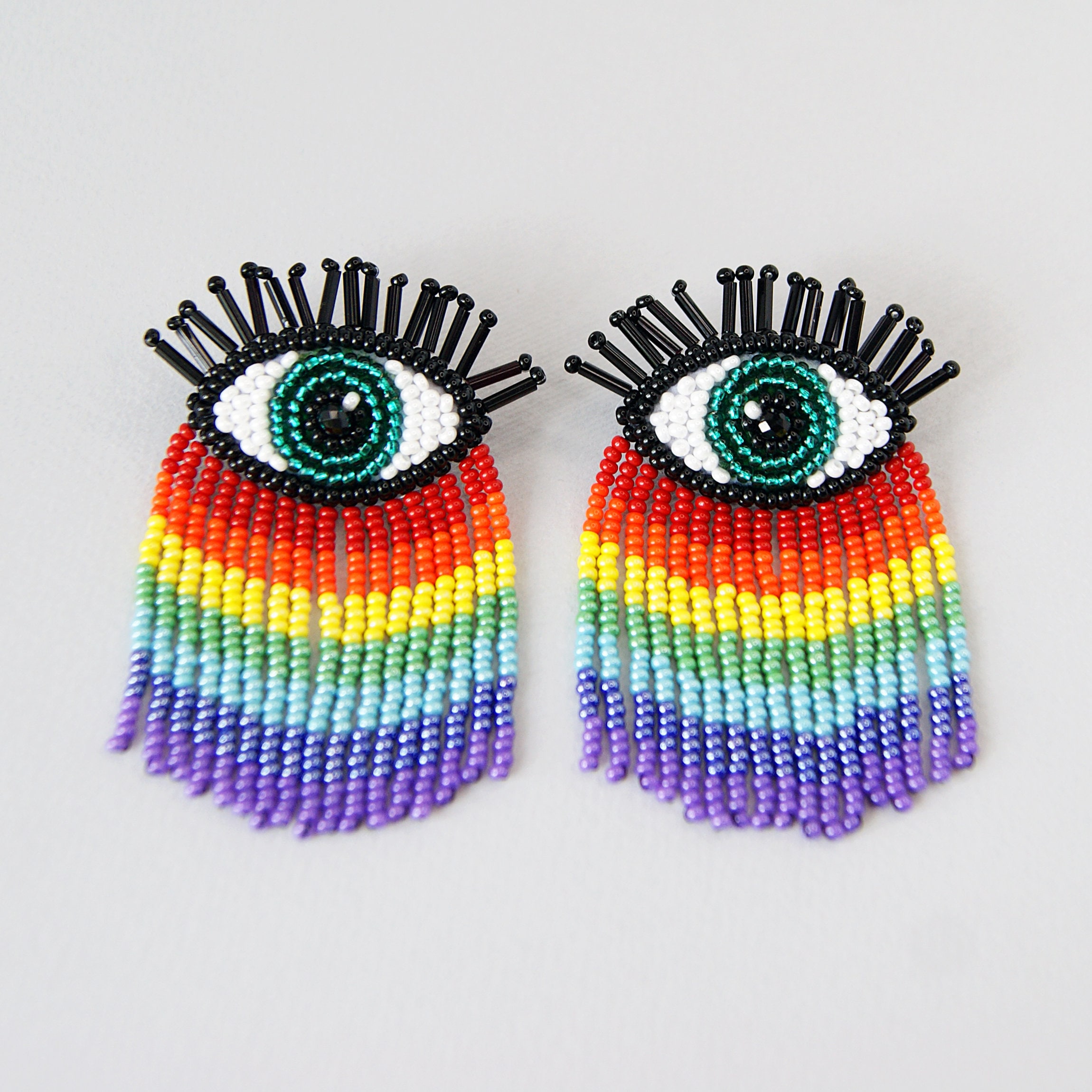 Rainbow evil eye earrings. Beaded fringe earrings. | Etsy