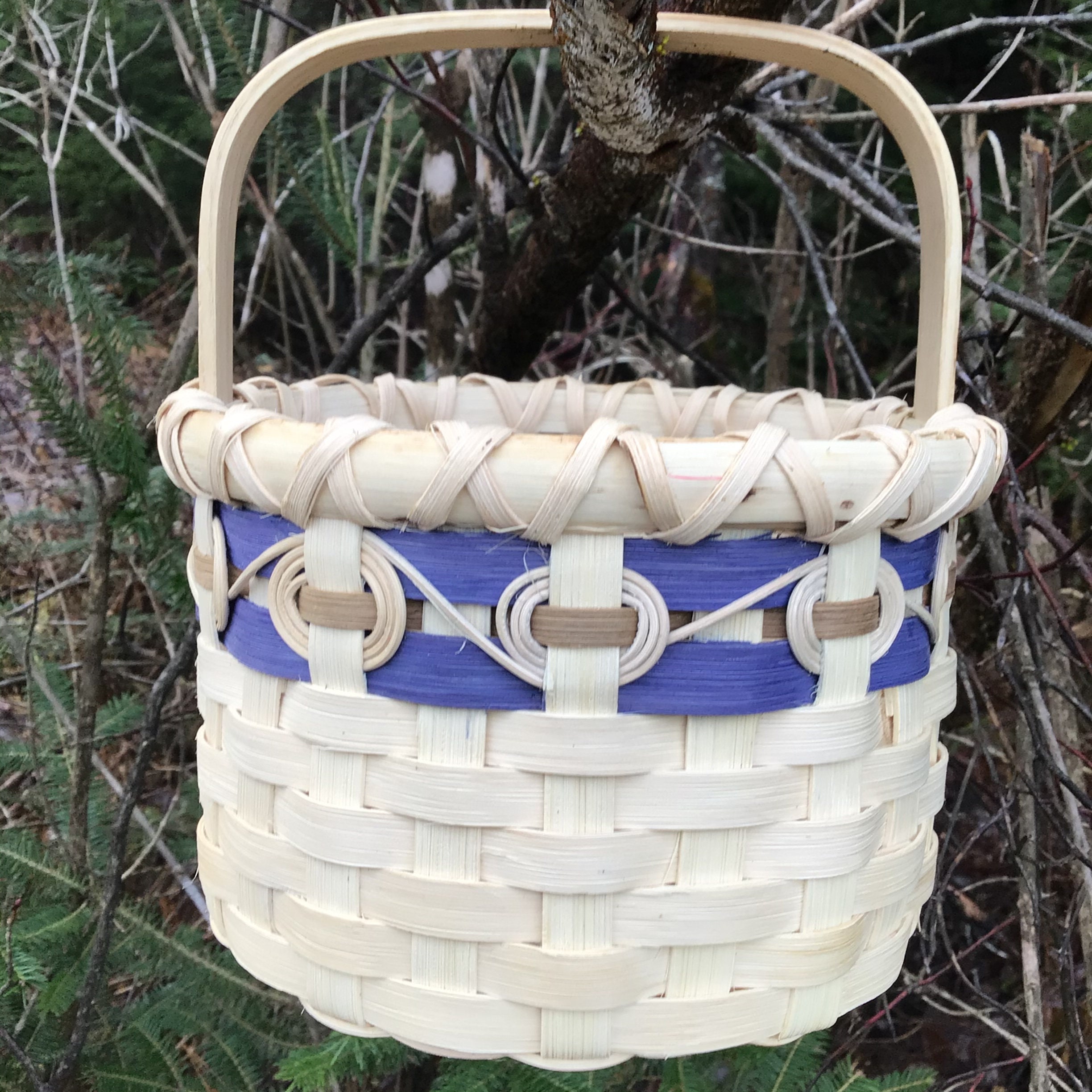 Handcrafted Round Reed Basket Accented With Colored Weavers and ...