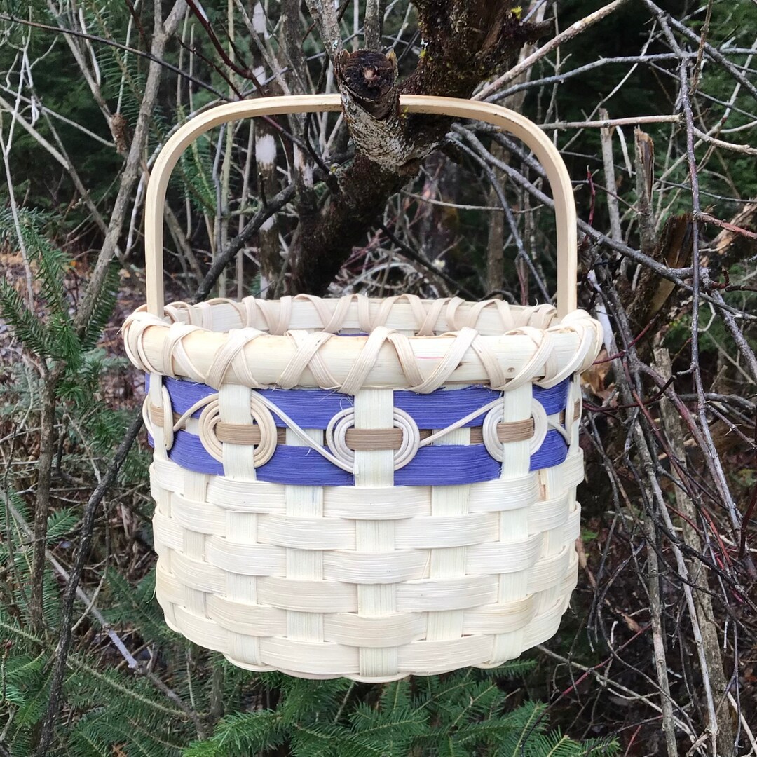 Handcrafted Round Reed Basket Accented With Colored Weavers and ...