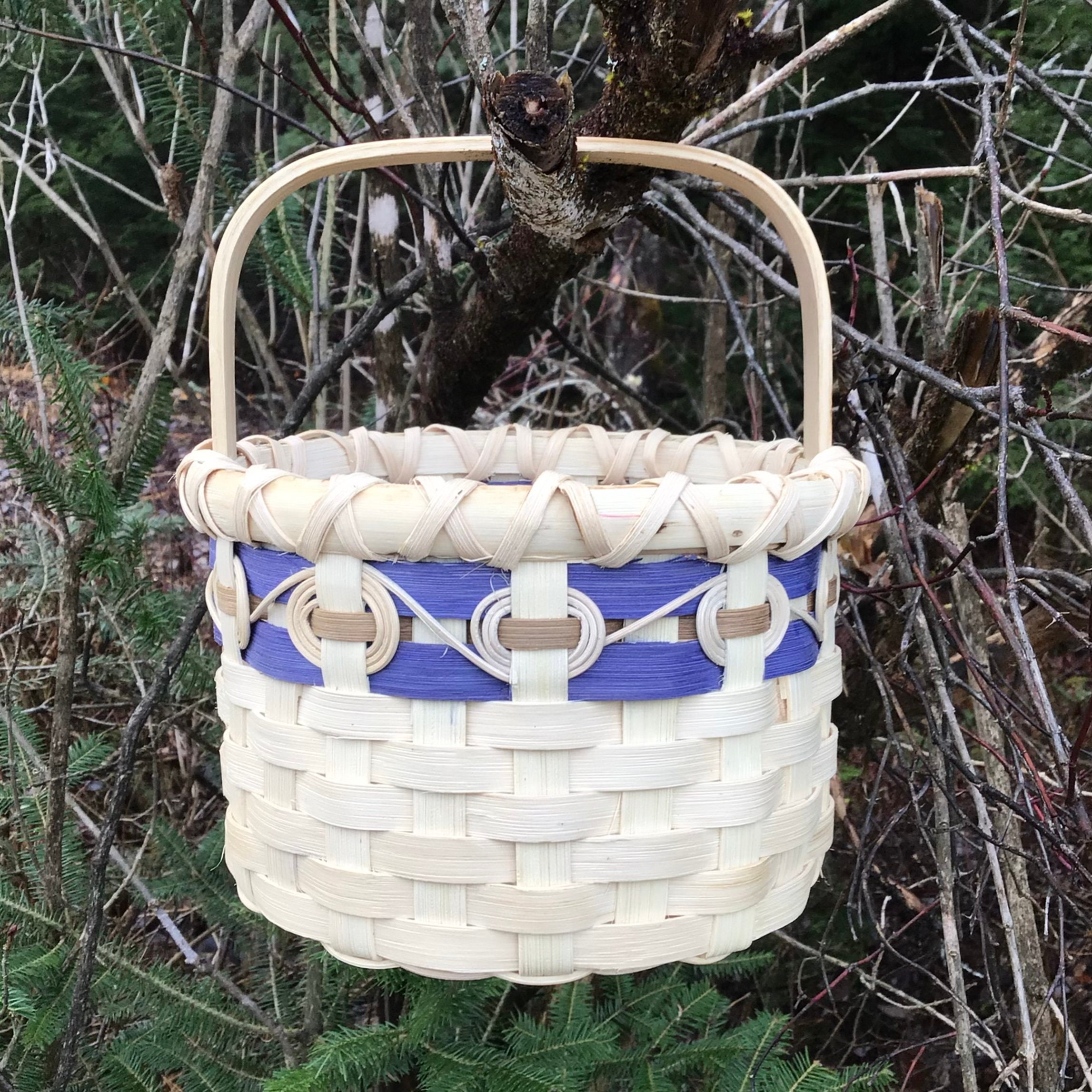 Handcrafted Round Reed Basket Accented With Colored Weavers and ...