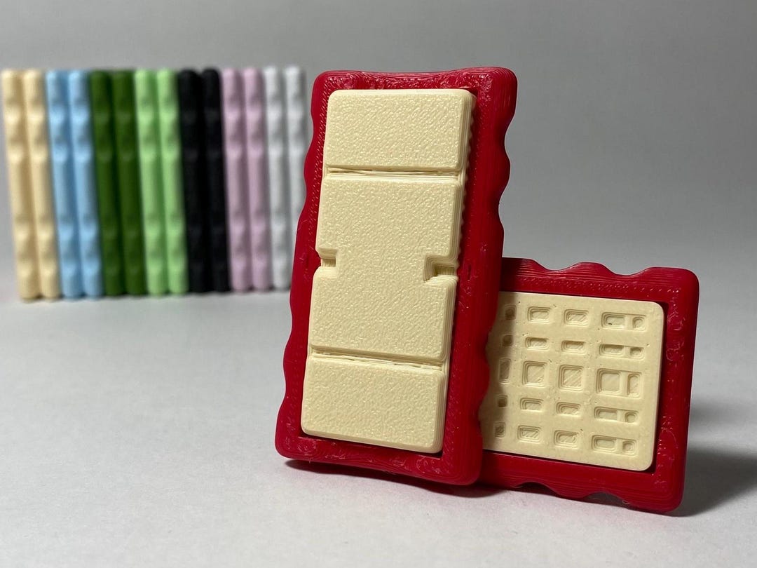 Fidget Slideswitch: Beige Core / Red Shell Transforming Magnetic Fidget ...