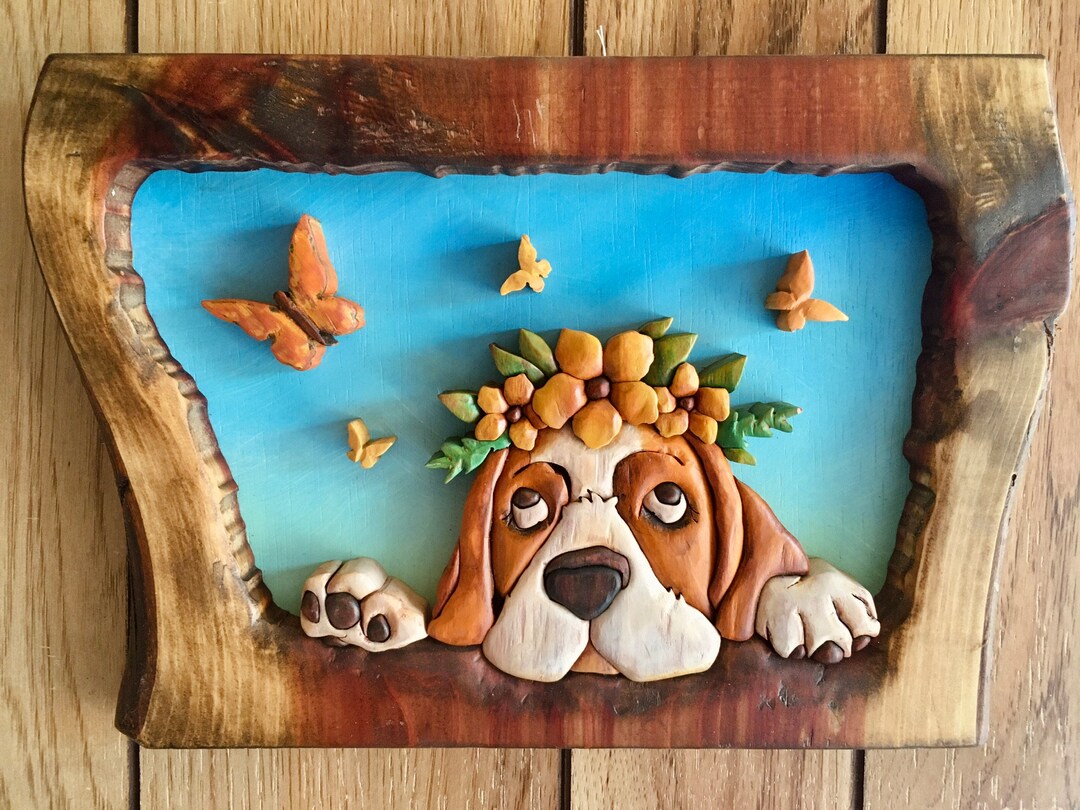 Carved Dog and Butterflies Wall Hanging on a Blue Gradient Background ...