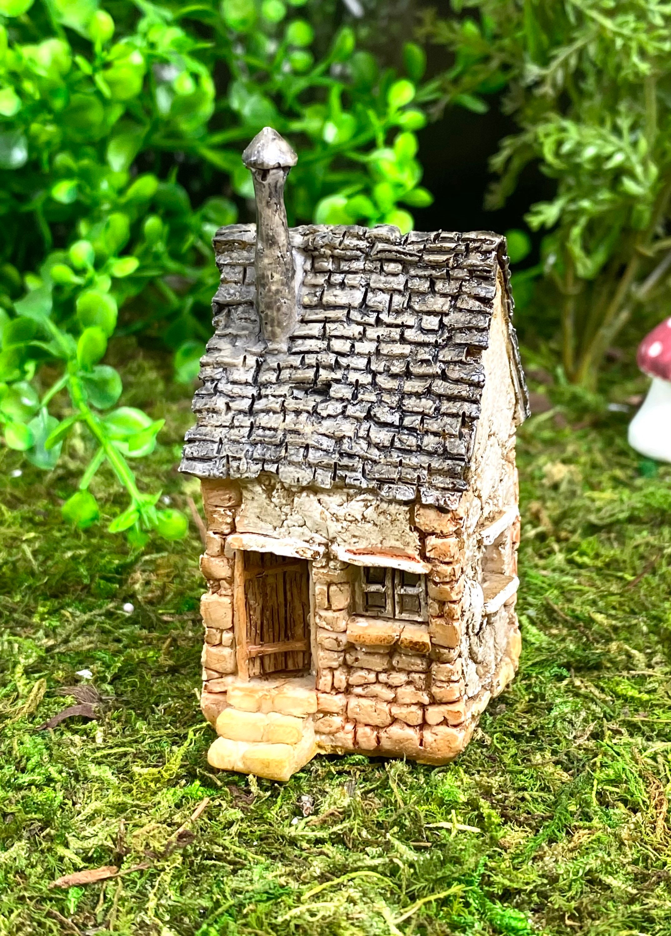 Miniature Fairy Cottages In Terrariums